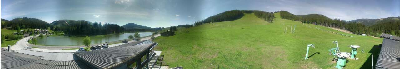 Webcam Teichalmlifte, Viewing direction Teichalm Panorama über See und ...